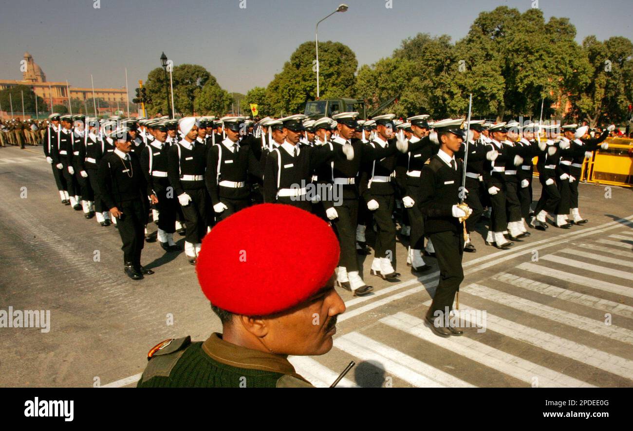 An Indian army soldier stands guard as Indian Navy contigent marches ...