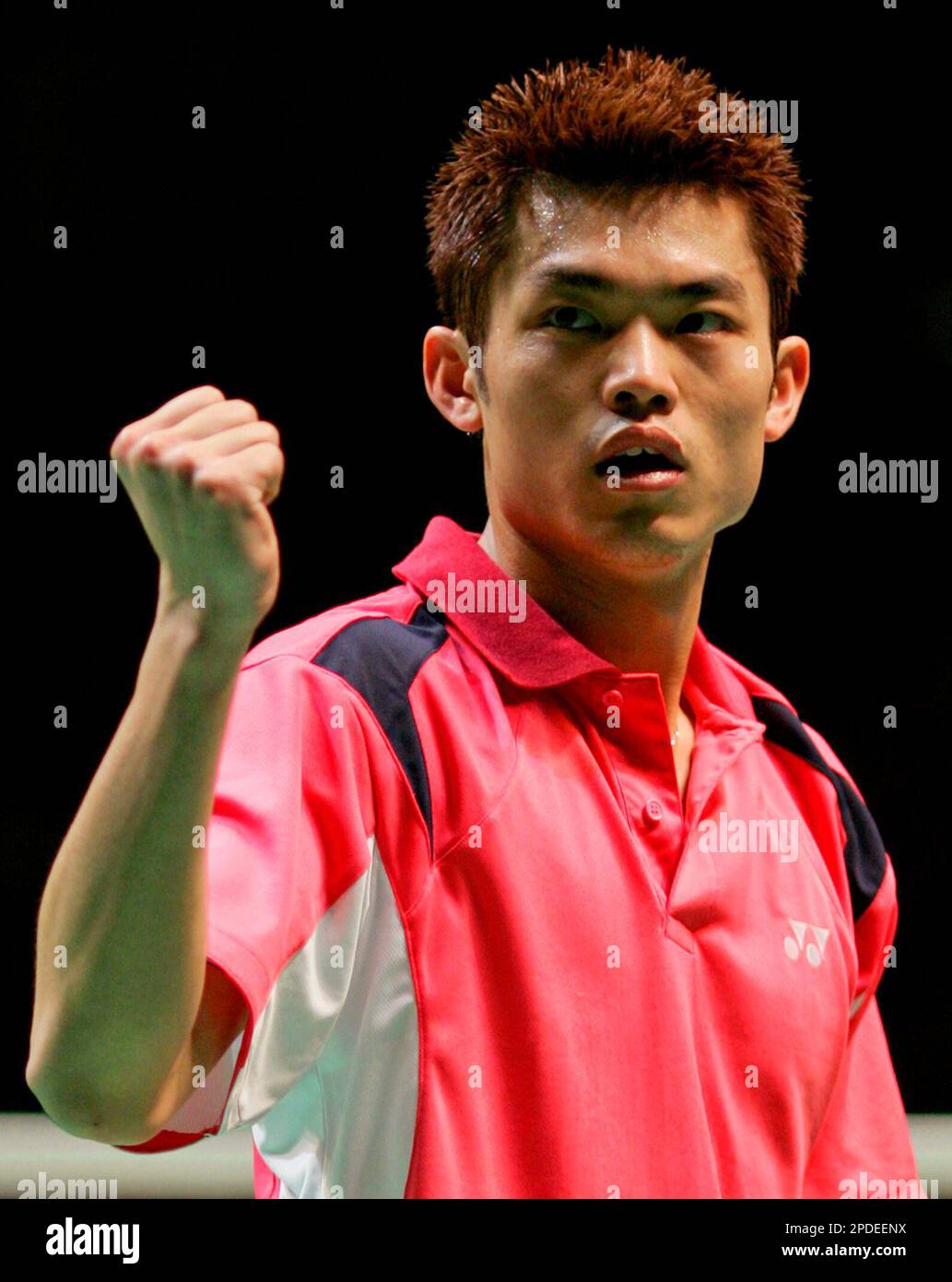 Number one seed China's Lin Dan celebrates winning his quarter-final ...
