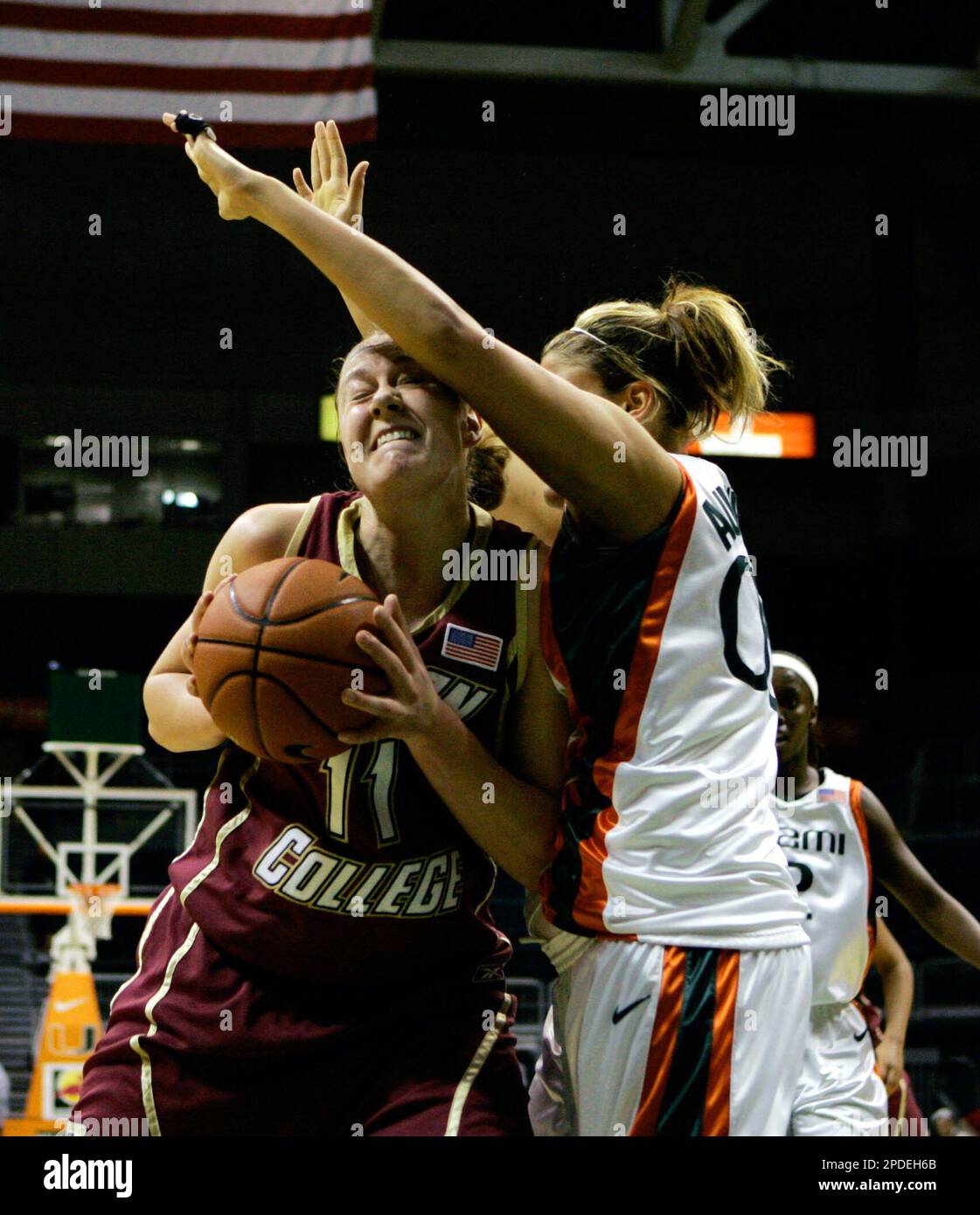 Boston College's Kathrin Ress (11) is fouled by Miami Amy Audibert (00 ...