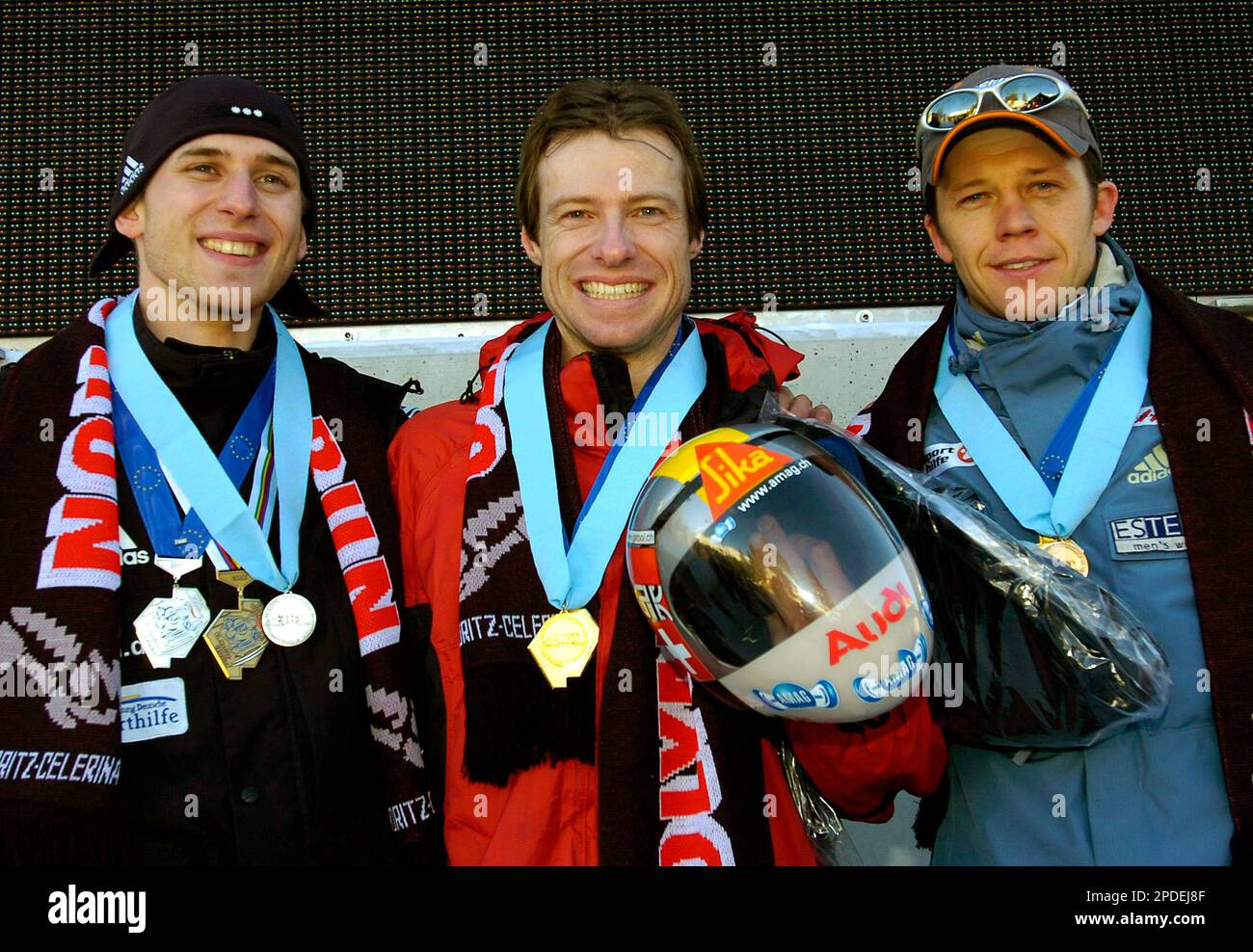Second placed Frank Rommel from Germany, left, winner, Gregor Staehli ...