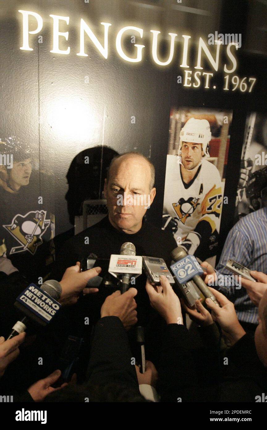 Pittsburgh Penguins General Manager Craig Patrick is swarmed by ...