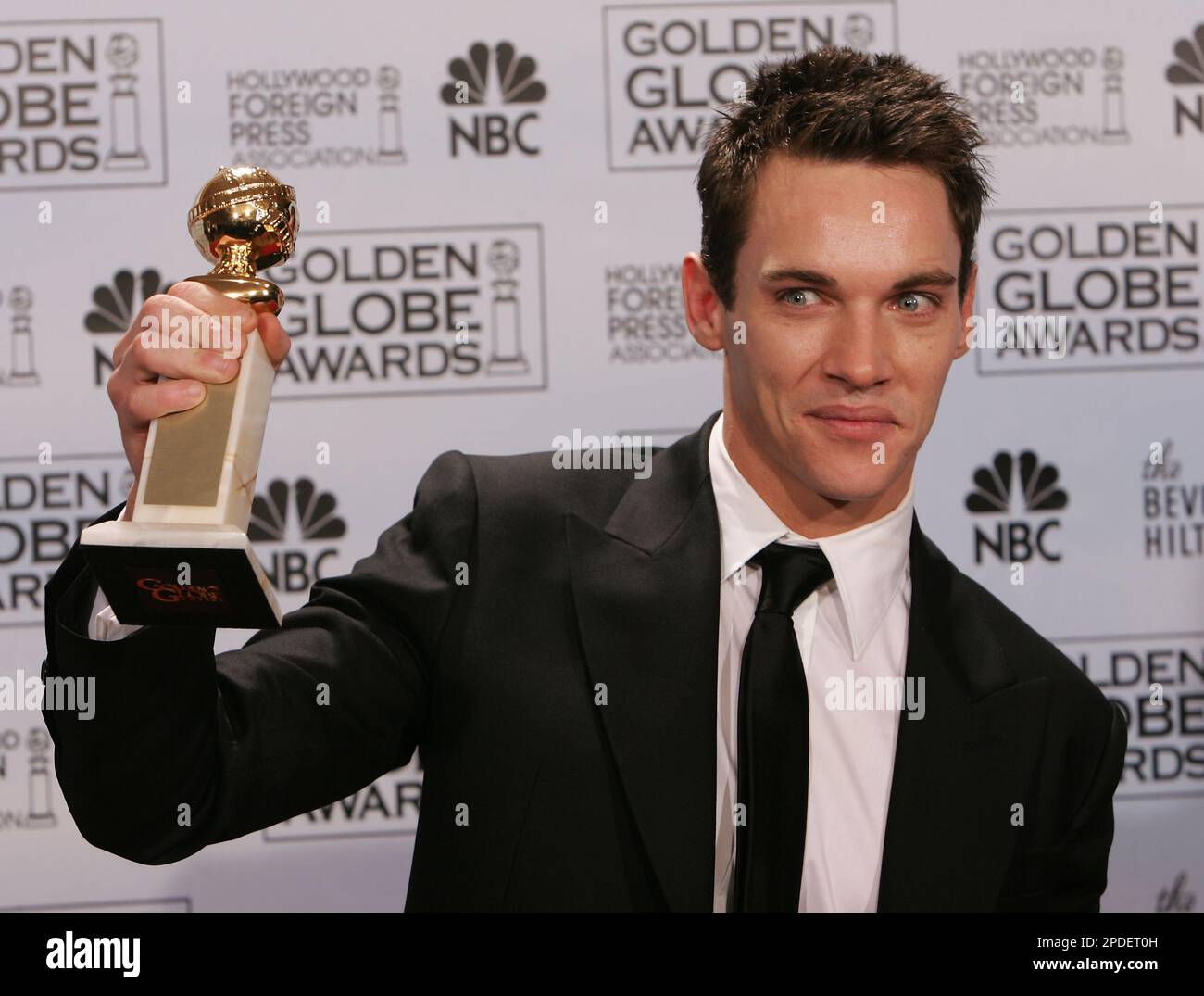 Irish actor Jonathan Rhys-Meyers poses with the award he won for best ...