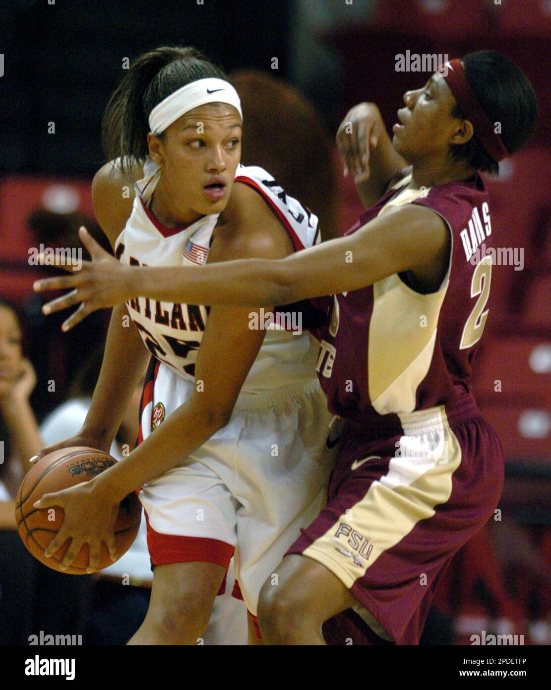 Maryland's Marissa Coleman looks to pass as Florida State's Tanae Davis ...
