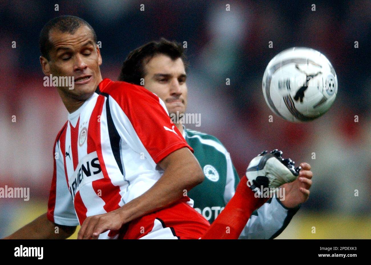Brazilian Rivaldo of Olympiakos, left, passes the ball as Croatian ...
