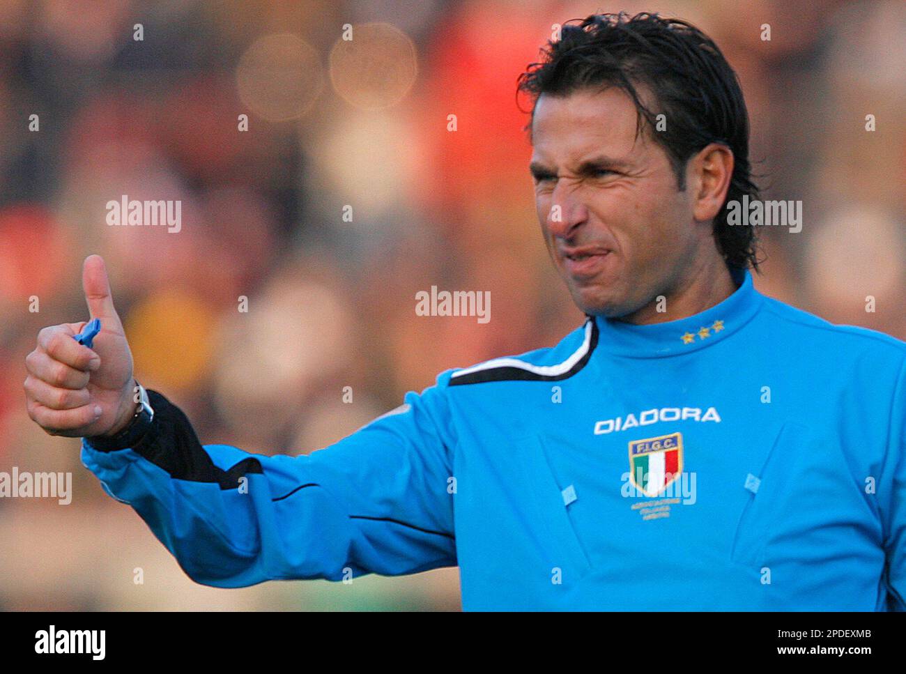 Italian referee Gianluca Paparesta reacts during an Italian first ...