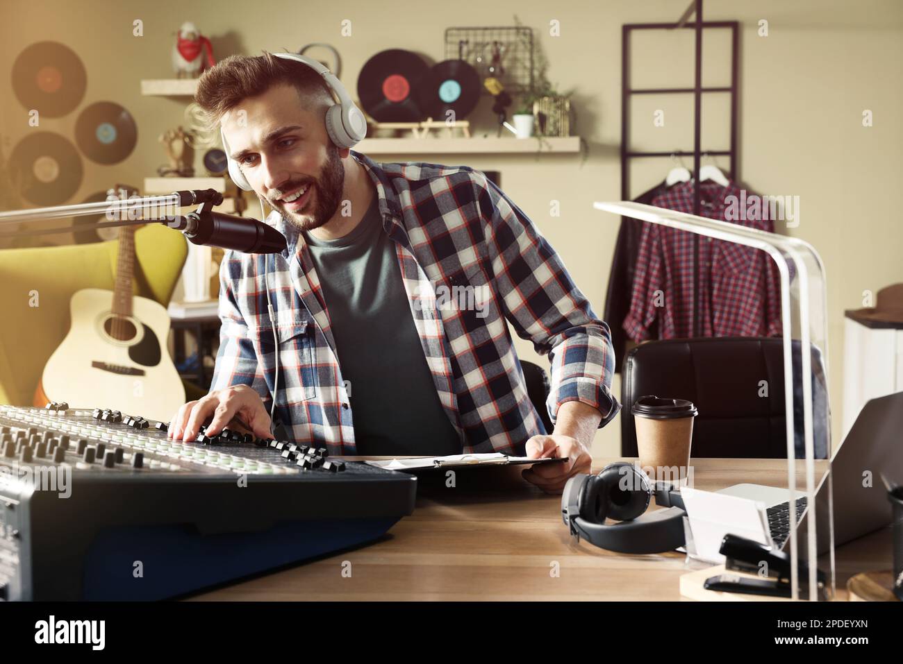 Man working as radio host in modern studio Stock Photo - Alamy