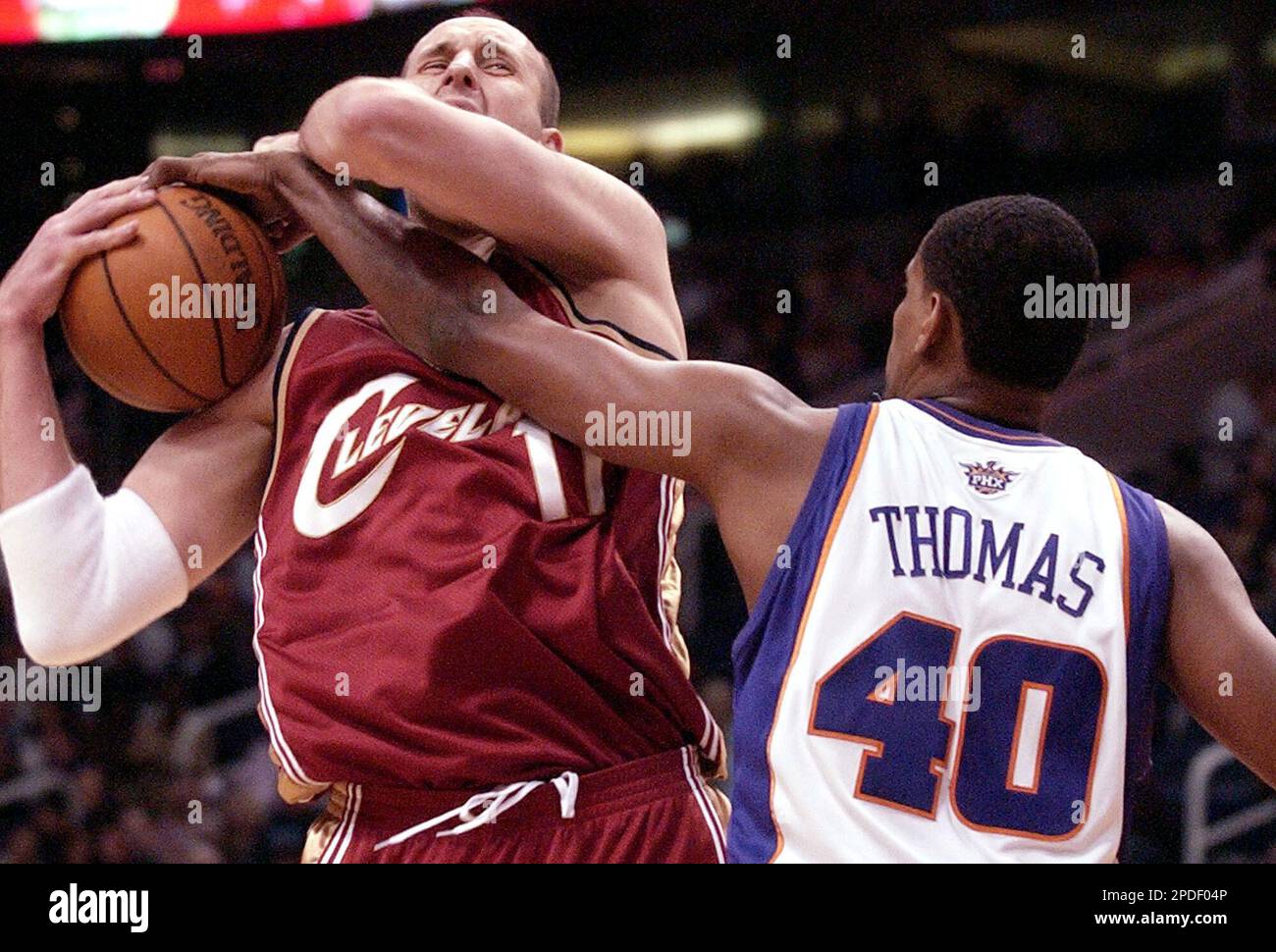 Phoenix Suns center Kurt Thomas (40) reaches in and fouls Cleveland ...