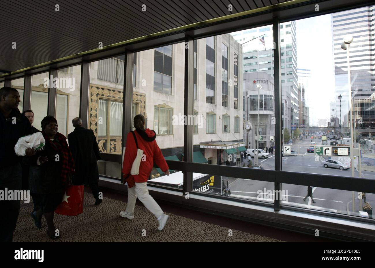 **ADVANCE FOR SUNDAY, JAN. 15** Pedestrians walk through a skywalk ...