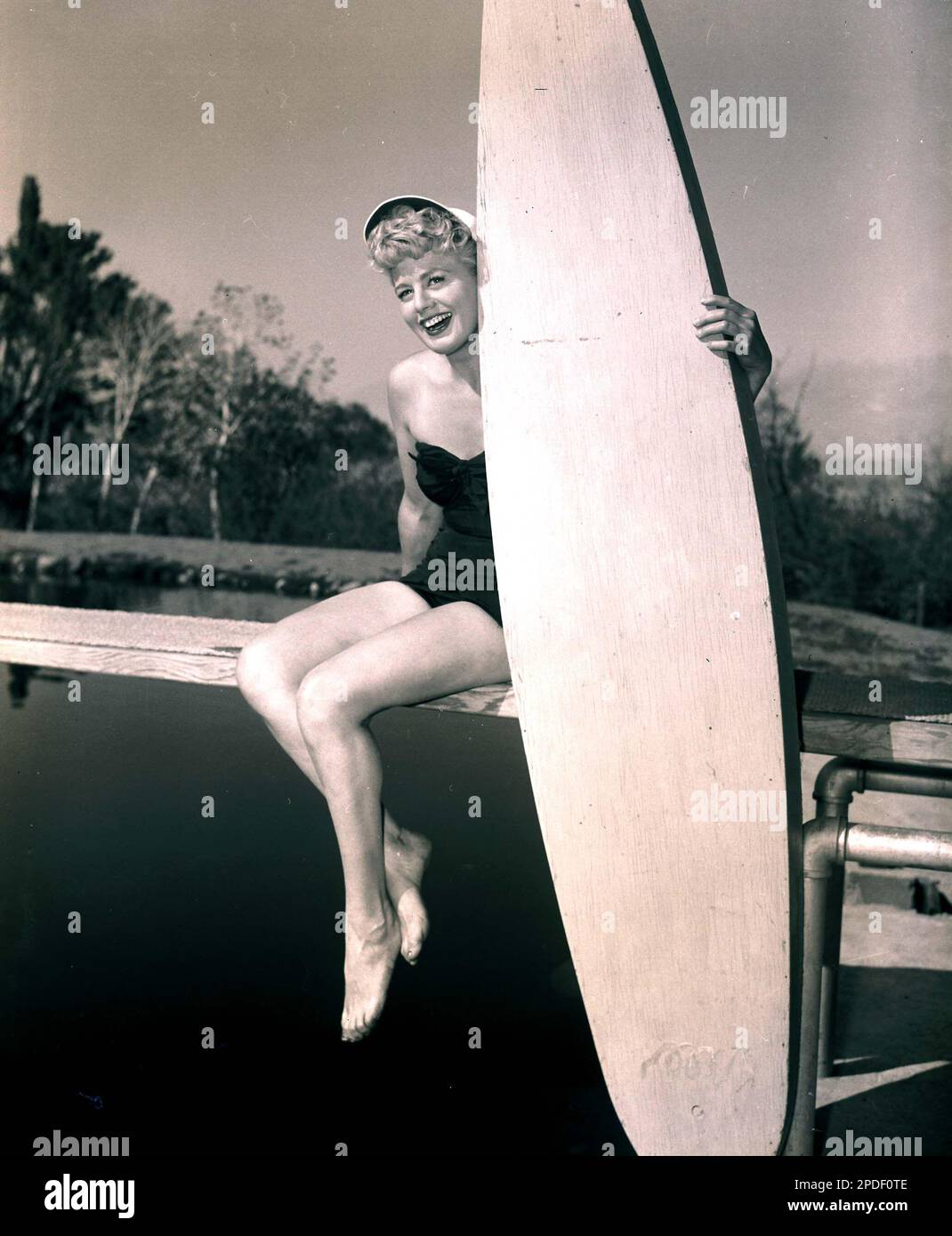 ** FILE ** Actress Shelley Winters poses with a surf board in this June ...