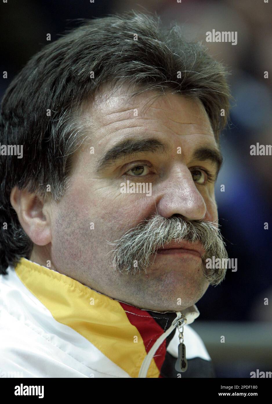 Heiner Brand coach of German national team looks at his players during ...
