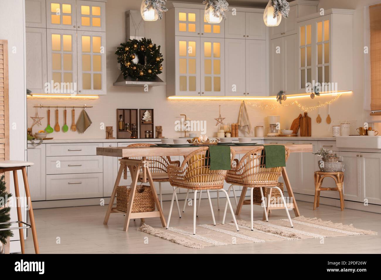 Cozy open plan kitchen decorated for Christmas. Interior design Stock ...