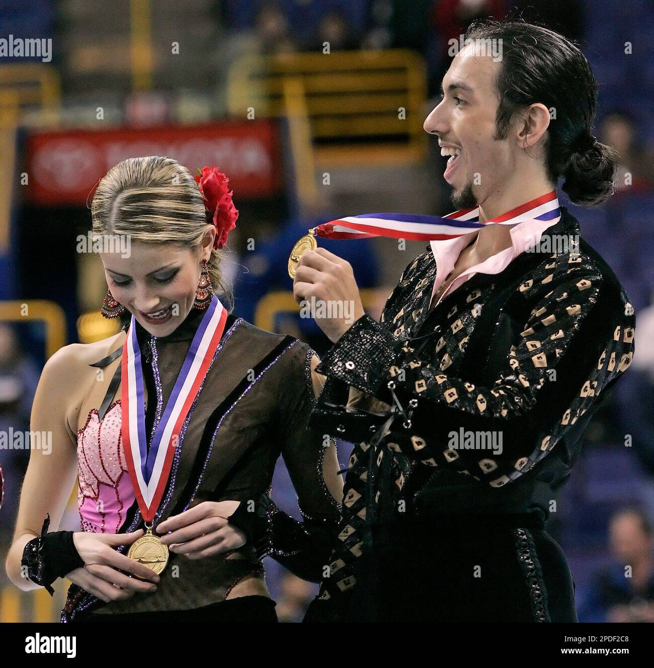 Benjamin Agosto, right, and Tanith Belbin display their gold medals ...