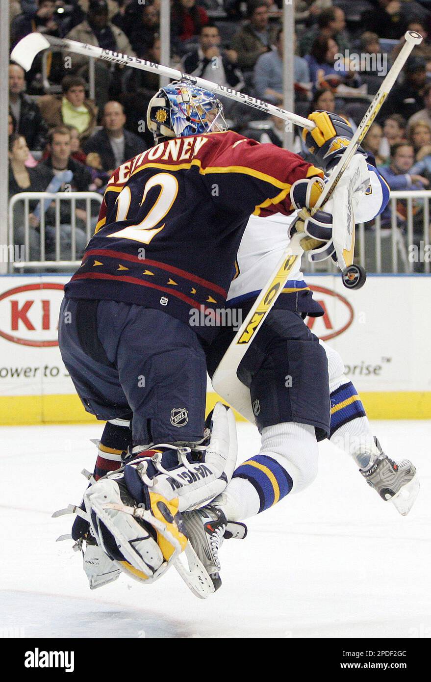 Atlanta Thrashers goalie Kari Lehtonen, of Finland, collides with St ...