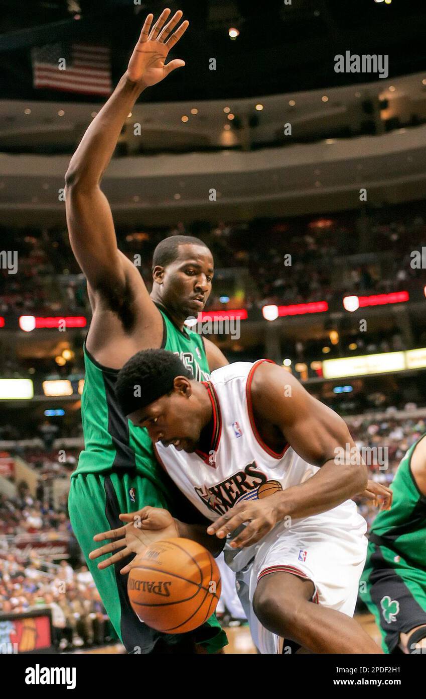 Boston Celtics' Kendrick Perkins, left, blocks Philadelphia 76ers ...