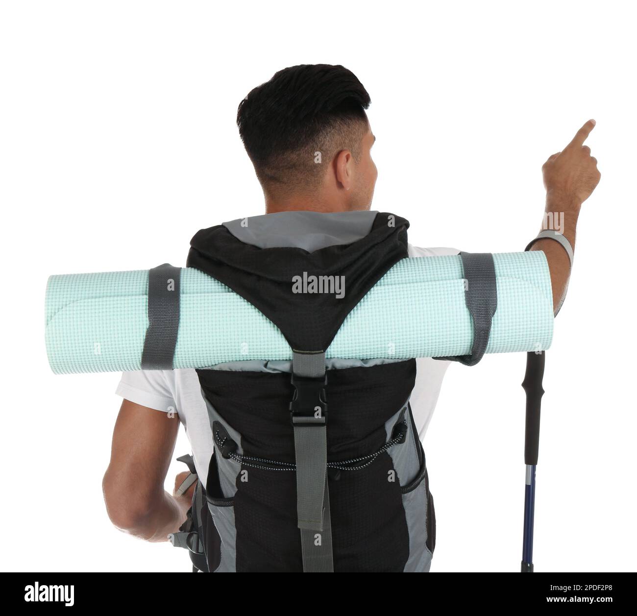 Male hiker with backpack and trekking poles on white background, back ...