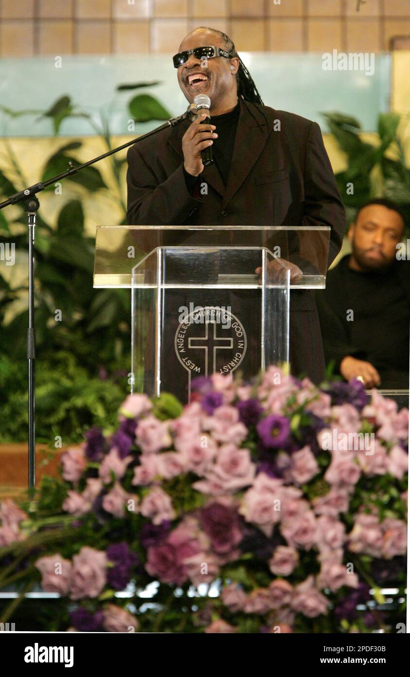 Stevie Wonder sings at the funeral for singer Lou Rawls at the West ...