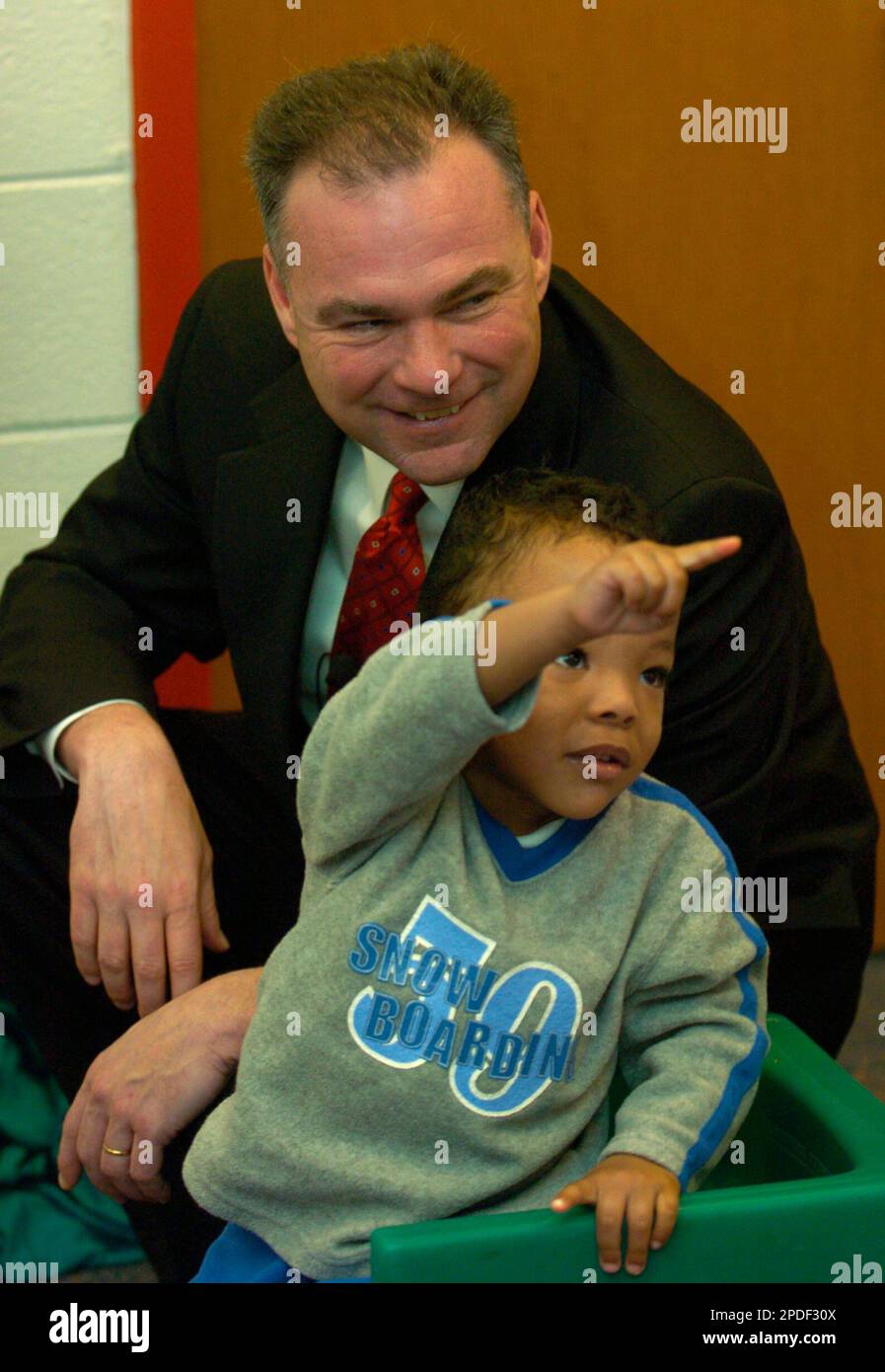 Virginia Governor-elect Timothy Kaine listens as three-year-old Dayon ...