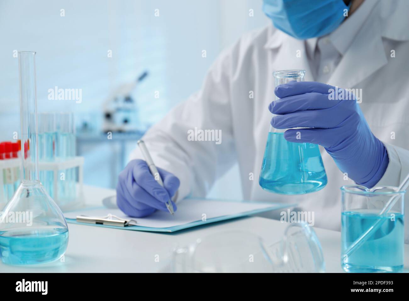Scientist working with sample in laboratory, closeup. Medical research ...