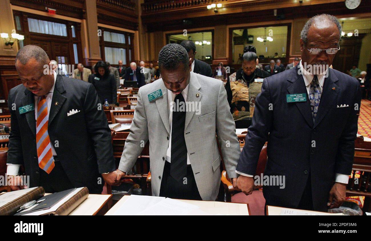Rep. Stan Watson, left, D-Decatur, Rep. Howard Mosby, center, D-Atlanta ...
