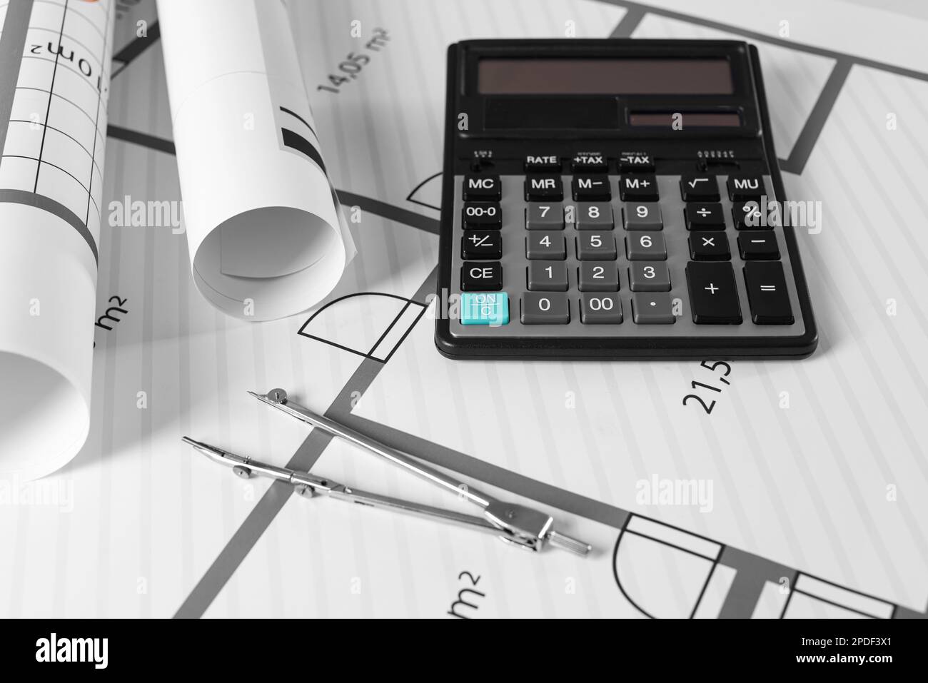 Construction drawings, calculator and dividers, closeup view Stock ...