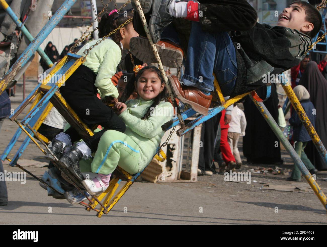 Iraqi children play in sunny weather on the last day of Eid al-Adha ...