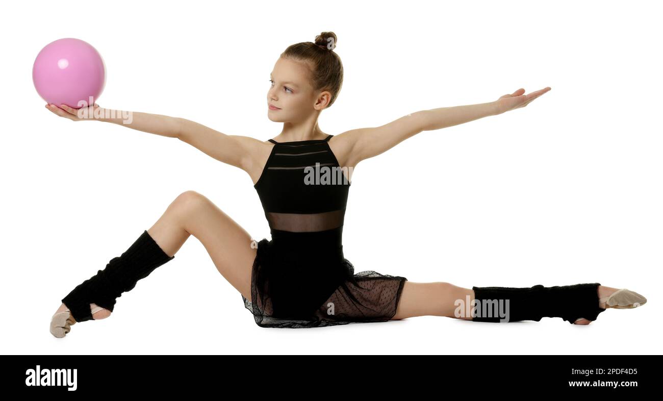 Cute little gymnast doing with ball on white background Stock Photo - Alamy