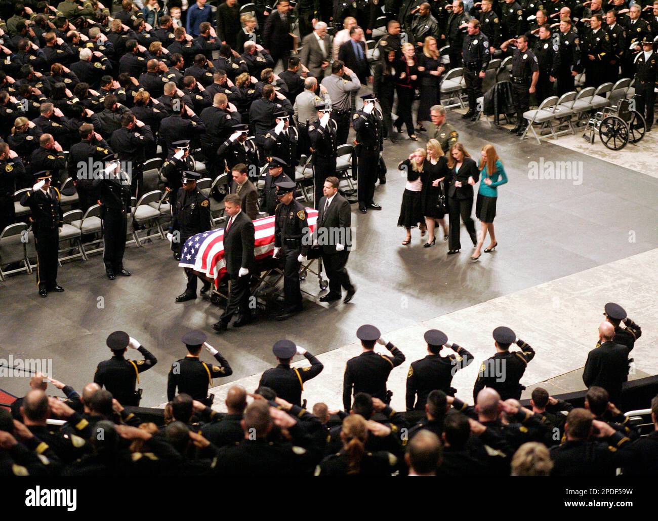 The body of slain East Palo Alto Police Officer Richard May is carried ...