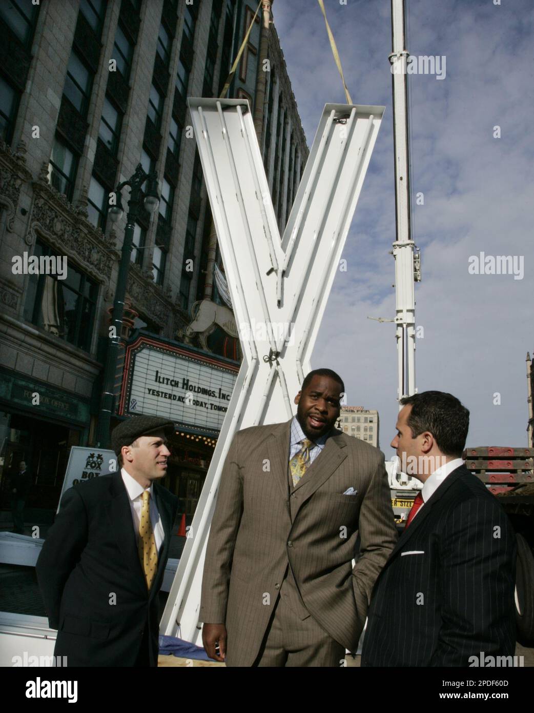 Detroit Mayor Kwame Kilpatrick, center, meets with Christopher Ilitch ...