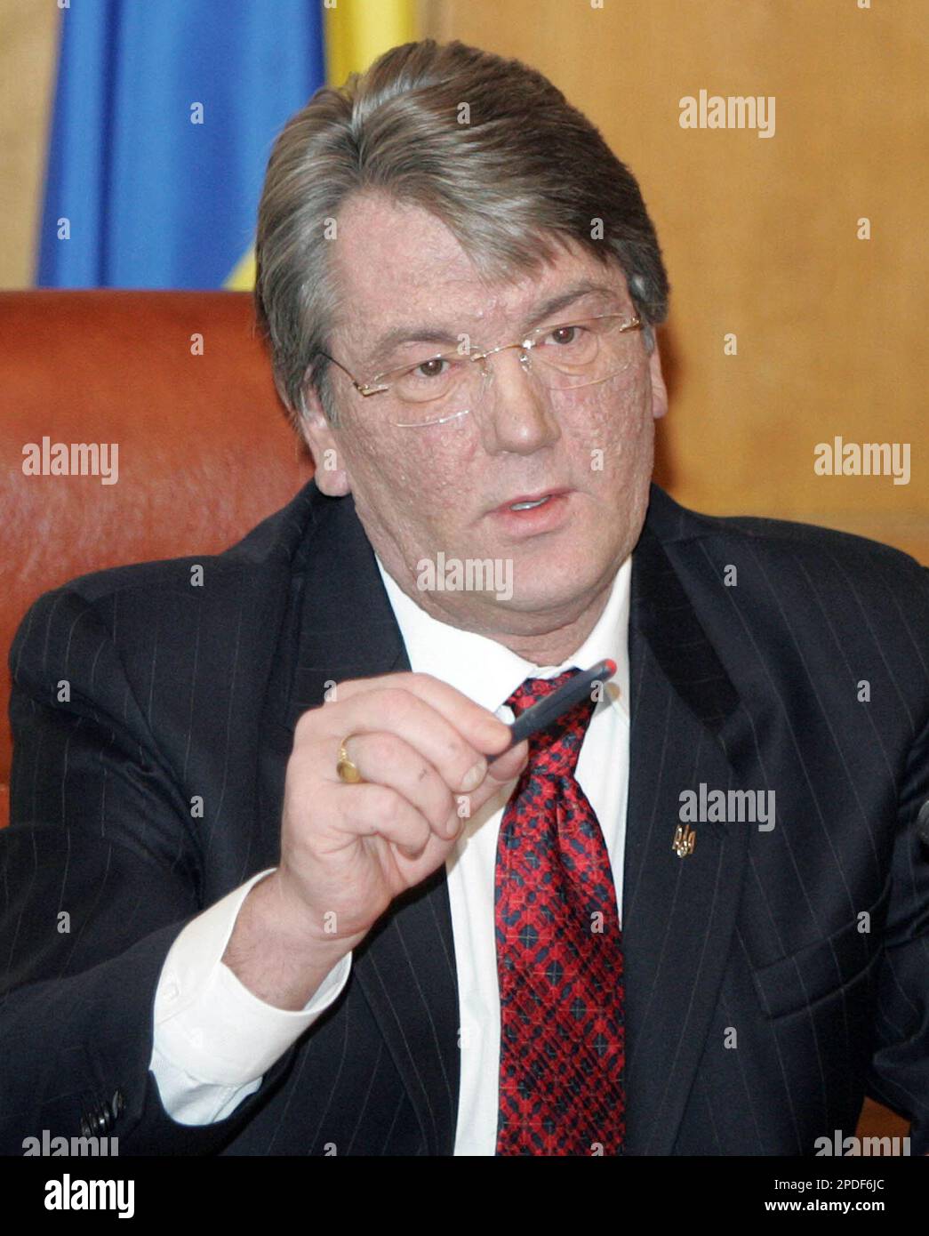 Ukrainian President Viktor Yushchenko speaks to Cabinet members in Kiev ...