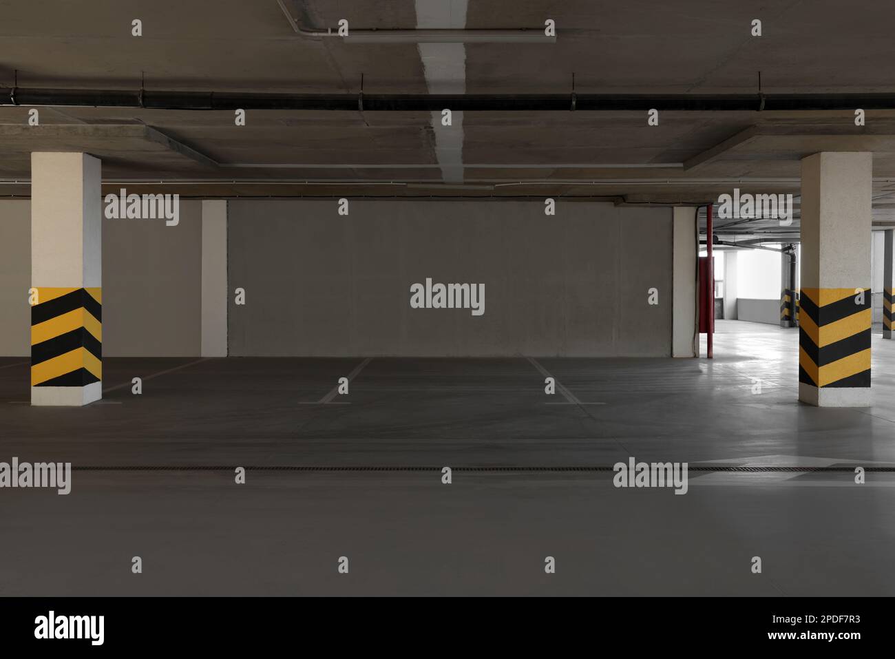 Open car parking garage with marking lines Stock Photo - Alamy