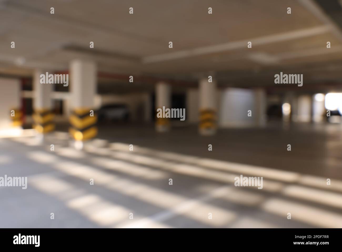 Blurred view of modern car parking garage Stock Photo - Alamy