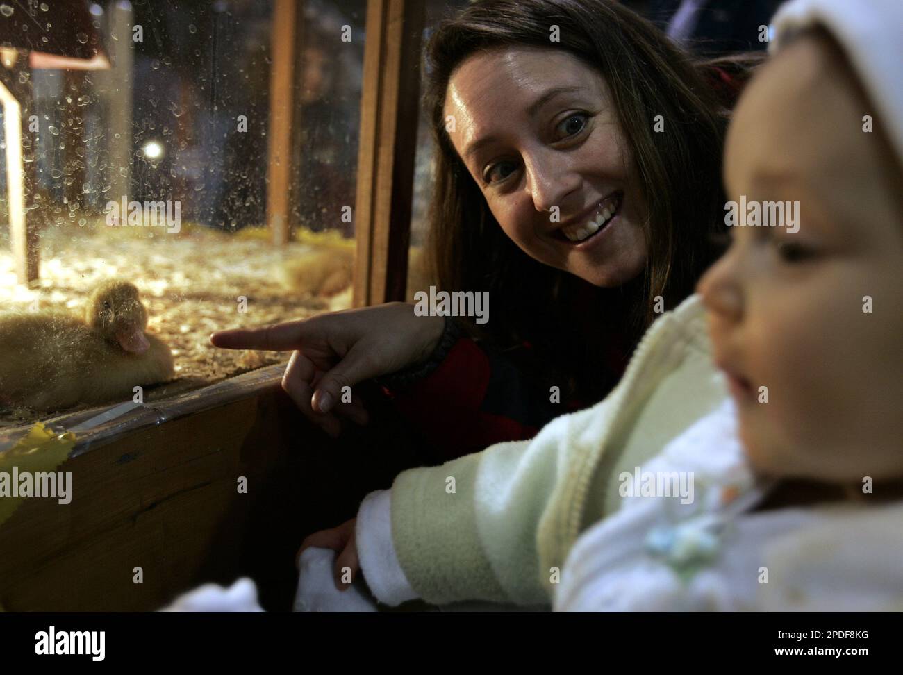 Jennifer Fissel from Mechanicsburg, Pa., shows her 8 month-old-daughter ...
