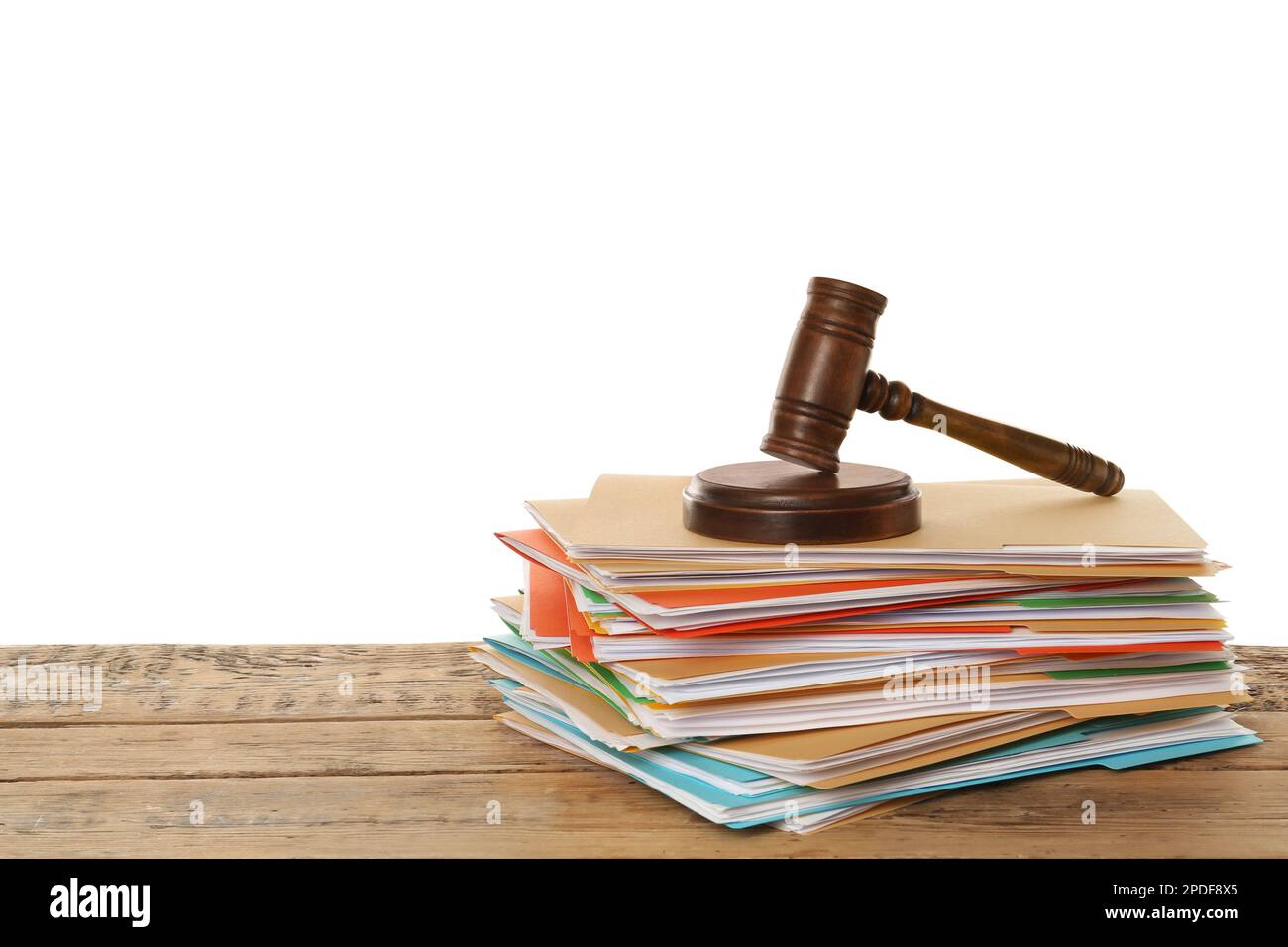 Stack of different files with documents and gavel on wooden table ...