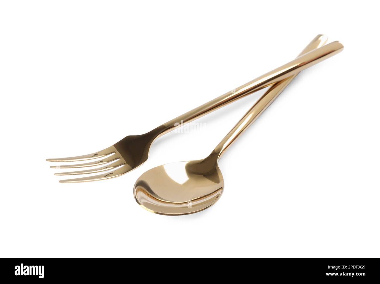 New shiny golden fork and spoon on white background Stock Photo - Alamy