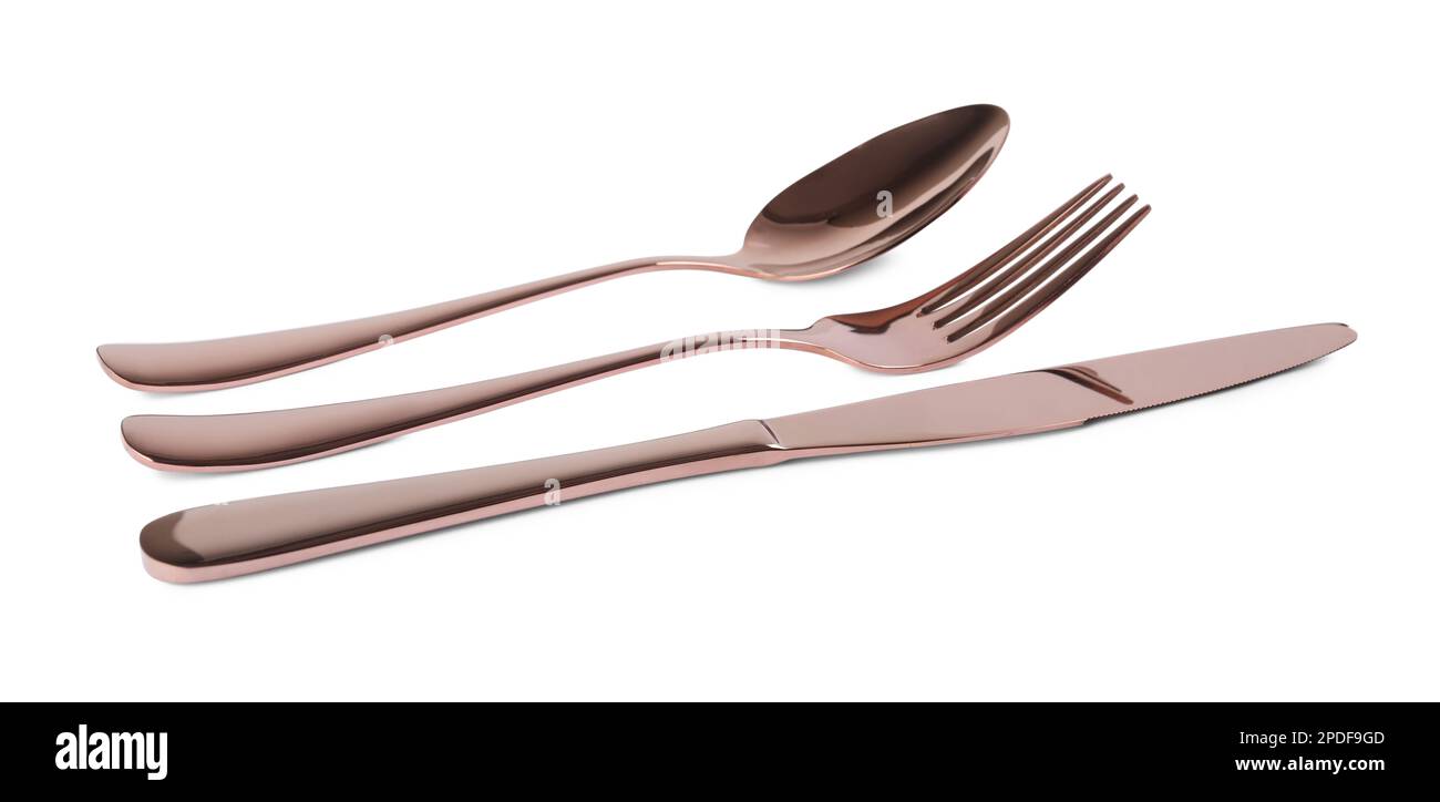 New shiny fork, spoon and knife on white background Stock Photo - Alamy