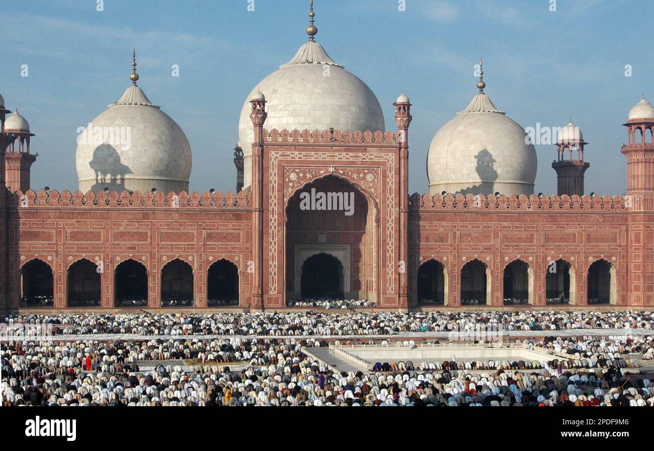 Pakistani Muslims offer prayers on Eid al-Adha day, Wednesday, Jan. 11 ...