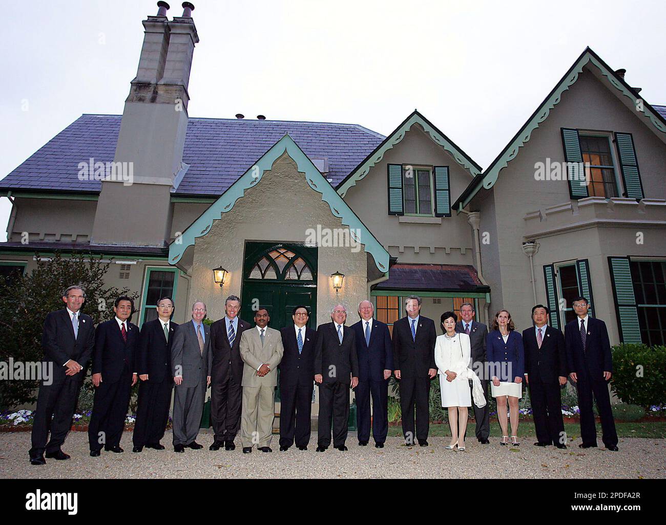 Delegates, left to right, Michael L'Estrange, secretary for the ...