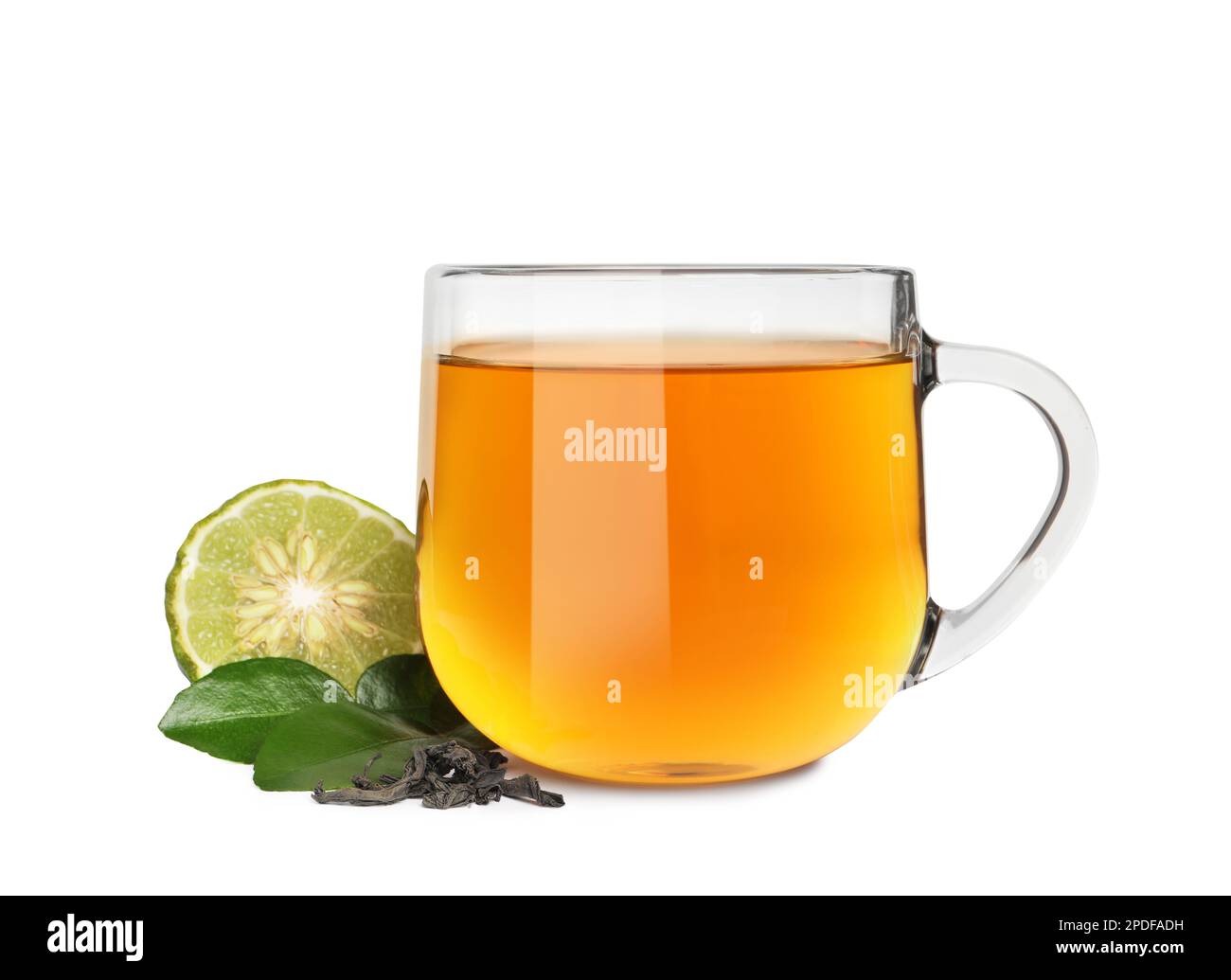 Glass cup of bergamot tea and fresh fruit on white background Stock ...