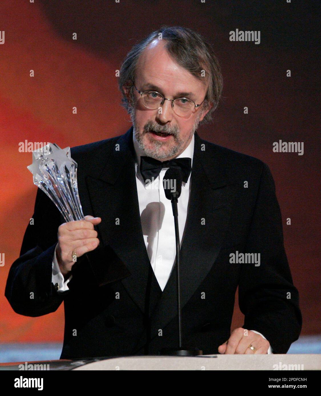 Peter Lord accepts the award for best animated feature for the film ...