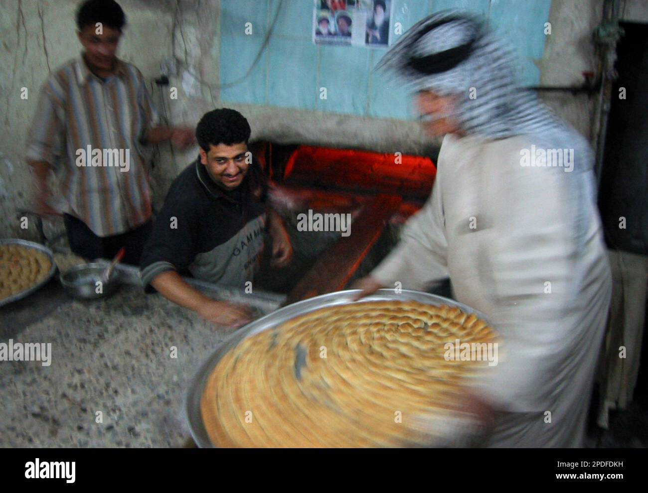 The men of a family-owned bakery cook Eid cookies for the upcoming ...