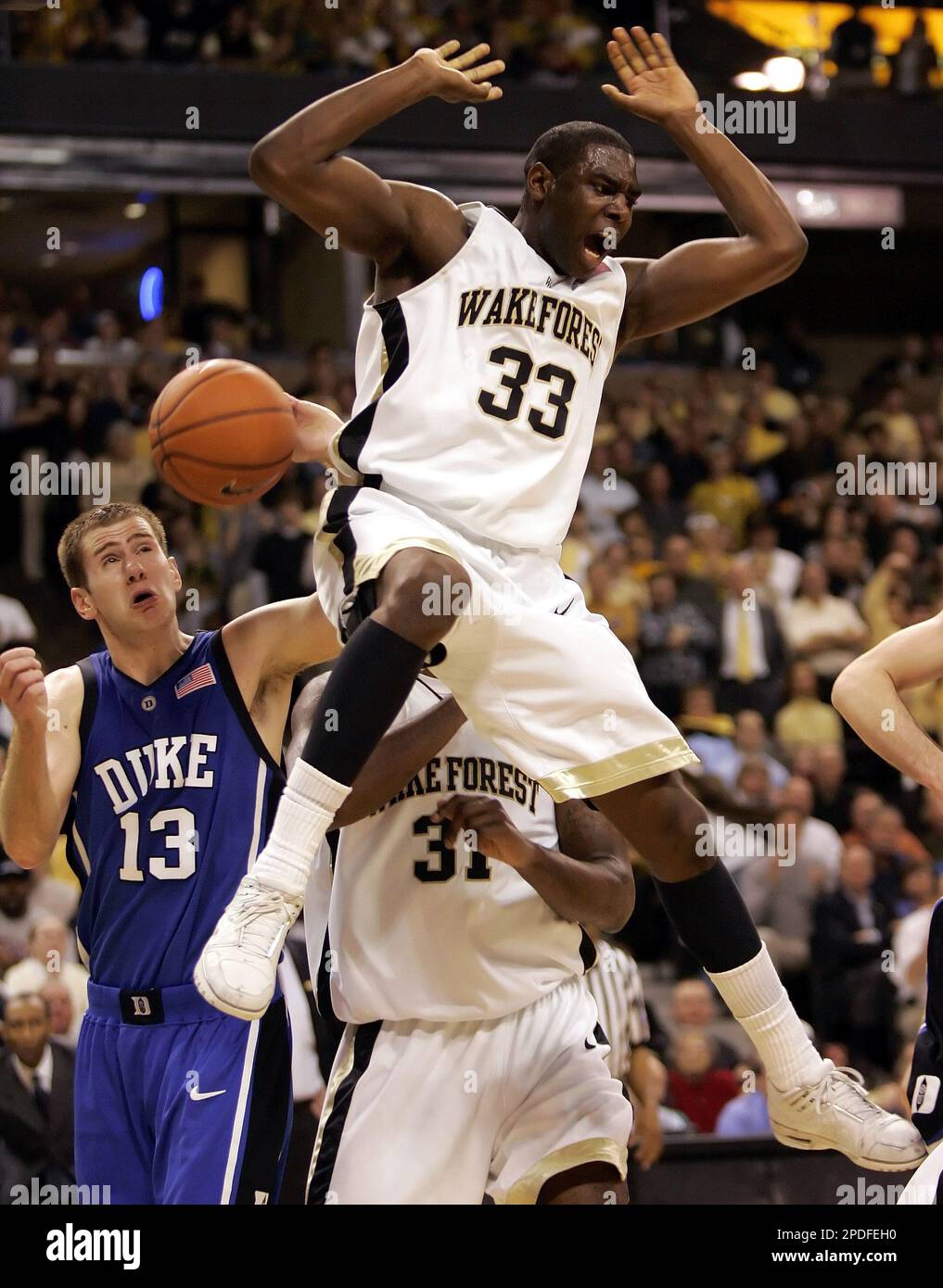 Wake Forest's Trent Strickland (33) reacts after dunking over Duke's ...