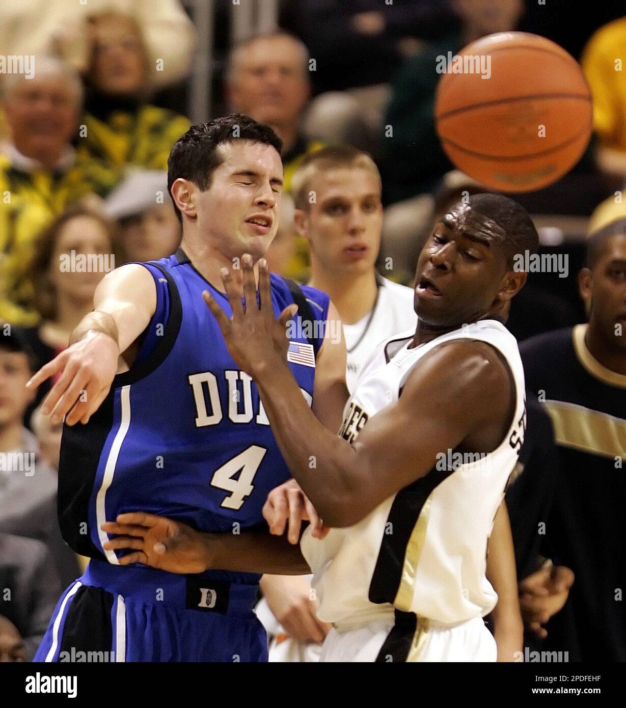 Duke's J.J. Redick (4) and Wake Forest's Trent Strickland, right ...