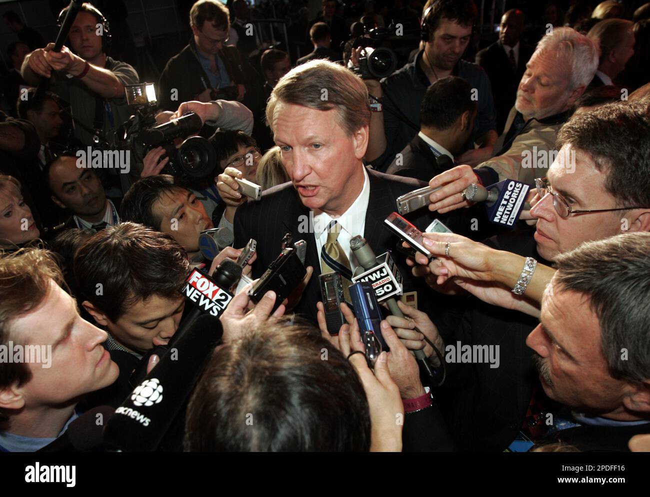 Rick Wagoner, General Motors chairman and CEO is surrounded by ...