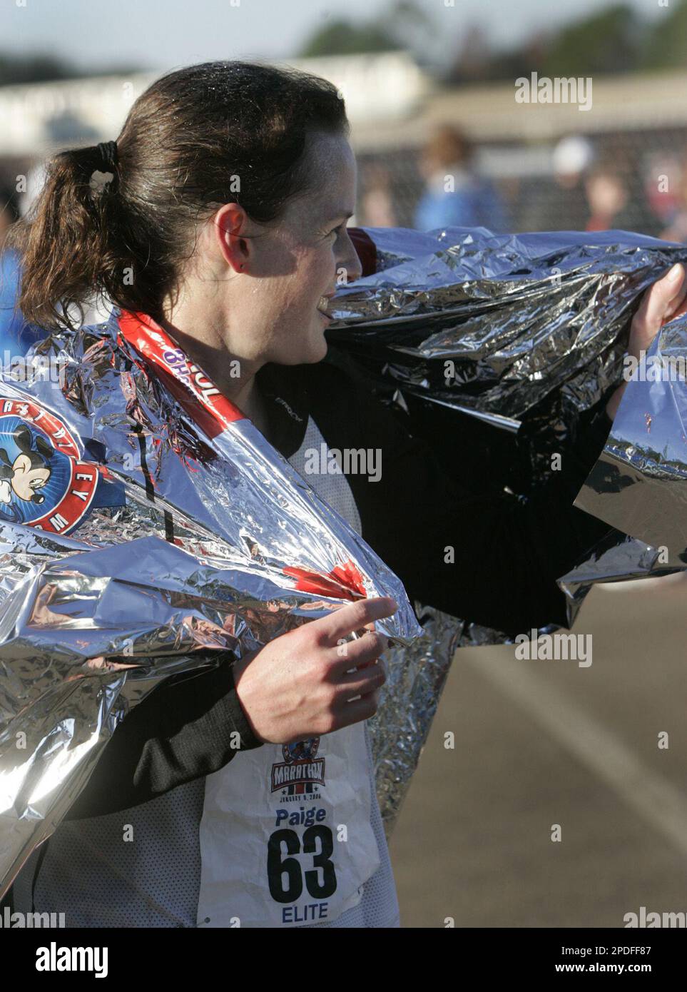 Paige Higgins, of Littleton, Colorado, waves to the crowd after ...