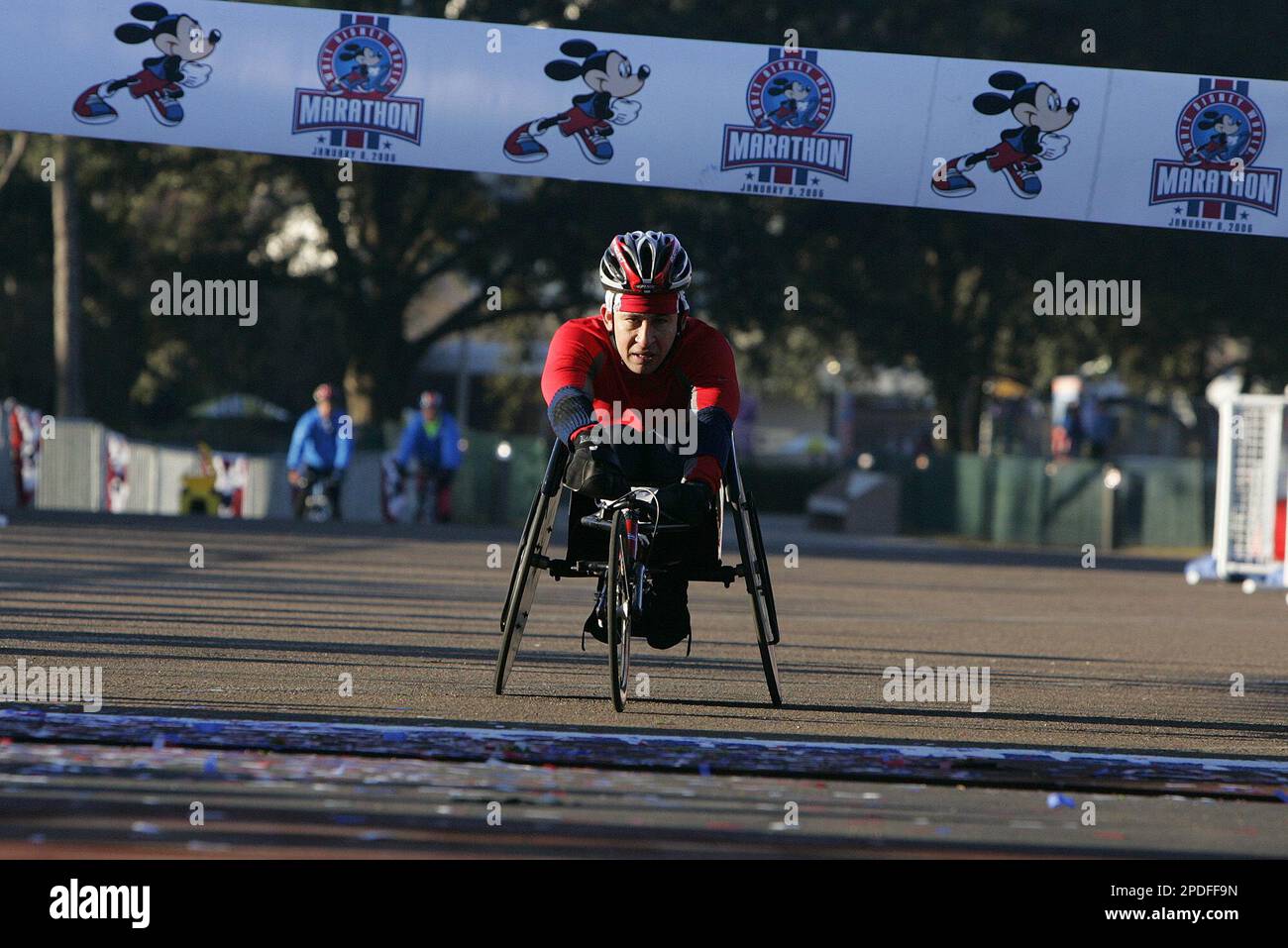 Renzo Martinez heads for the finish line to win in the wheelchair ...