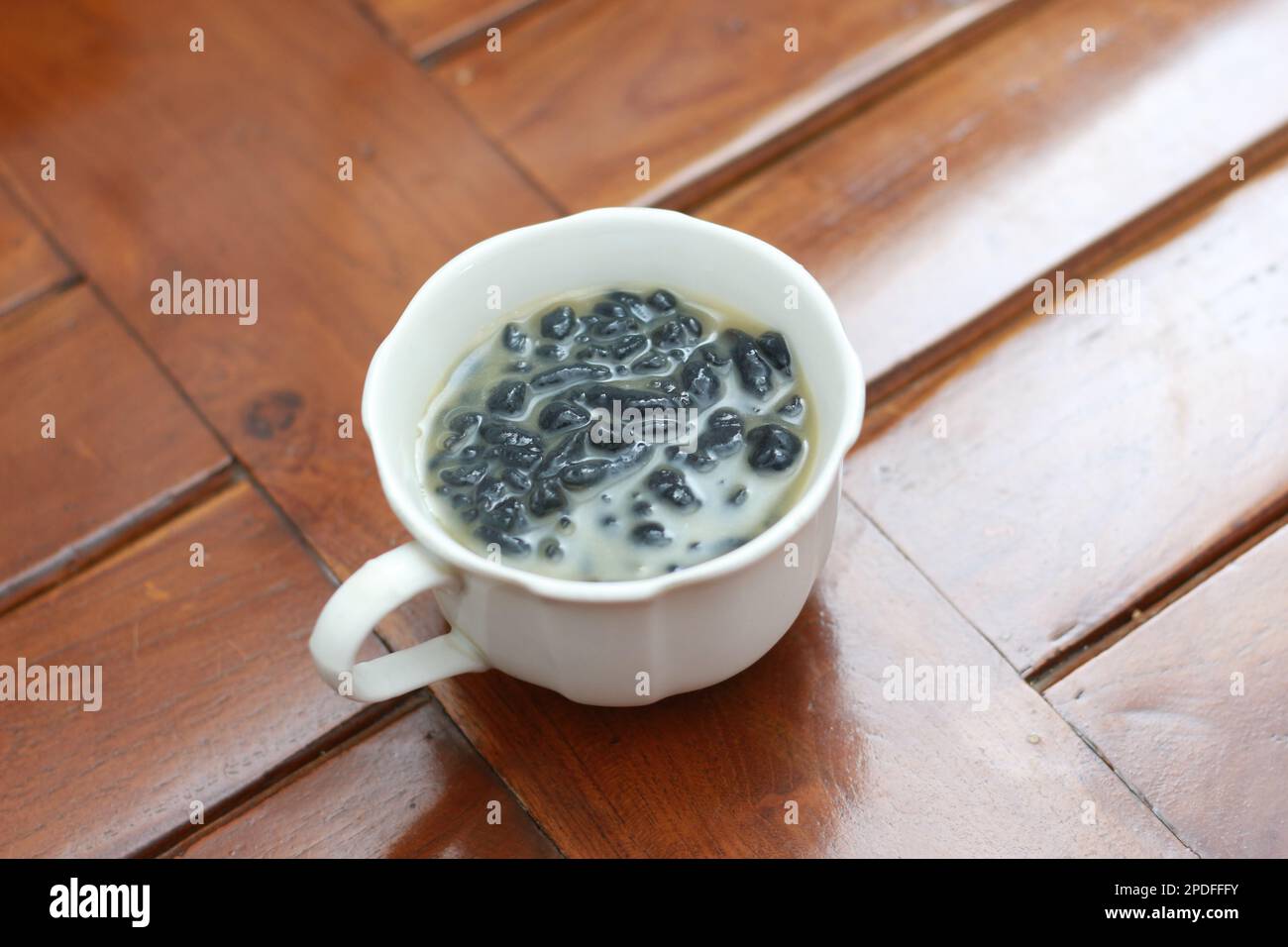 a close up of a glass of a traditional Indonesian drink called Dawet ...