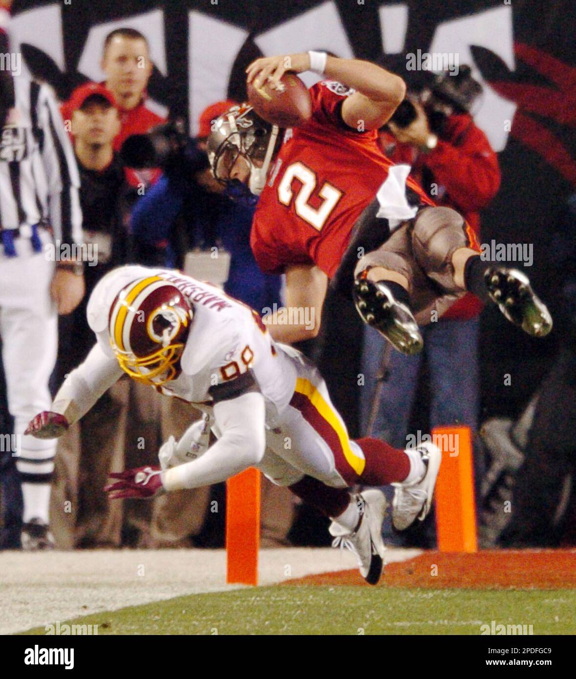 Tampa Bay Buccaneers quarterback Chris Simms (2) dives over Washington ...