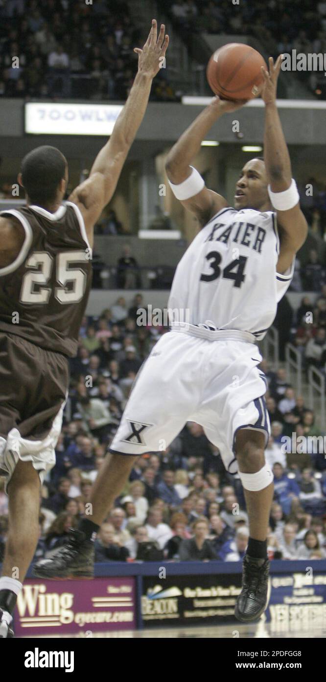 Xavier guard Stanley Burrell (34) takes a shot in front of St ...
