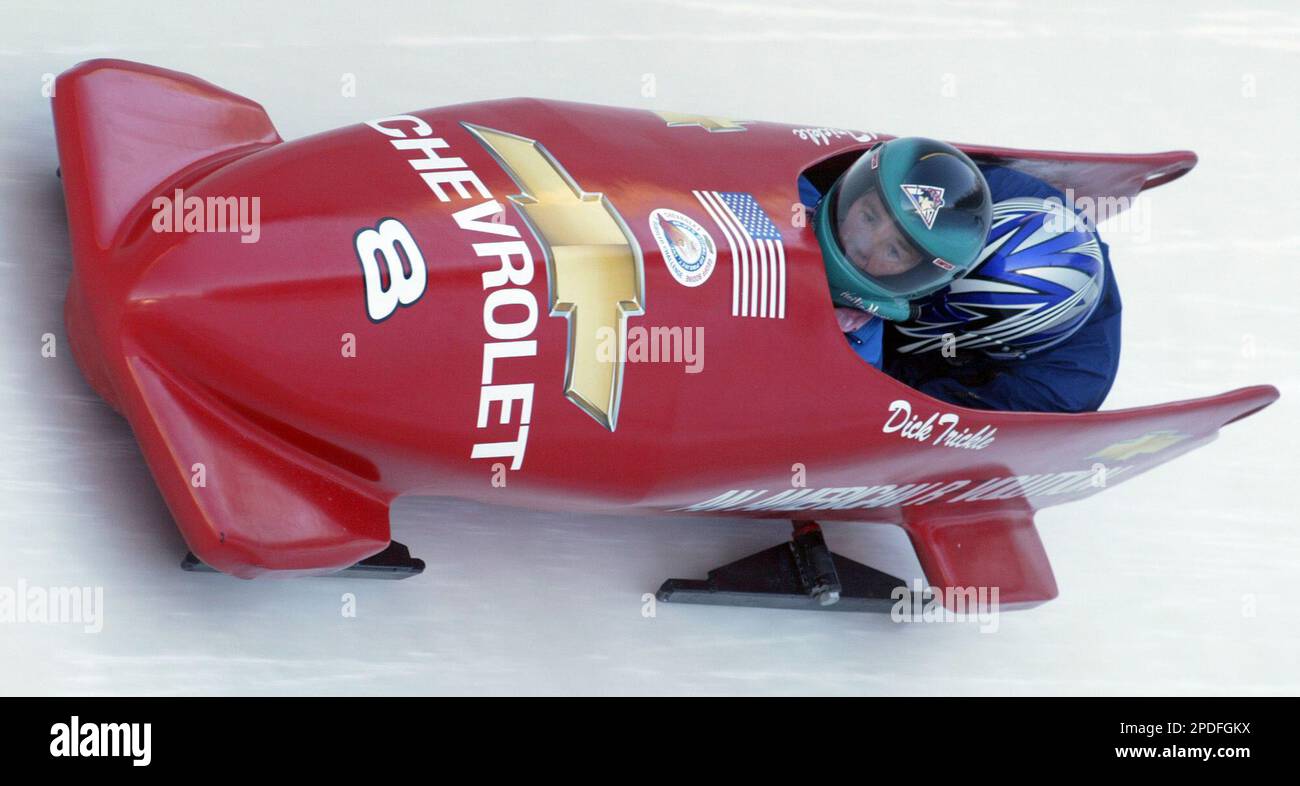 Dick Trickle, left, and Kelly Weaver take their bobsled throught Turn ...