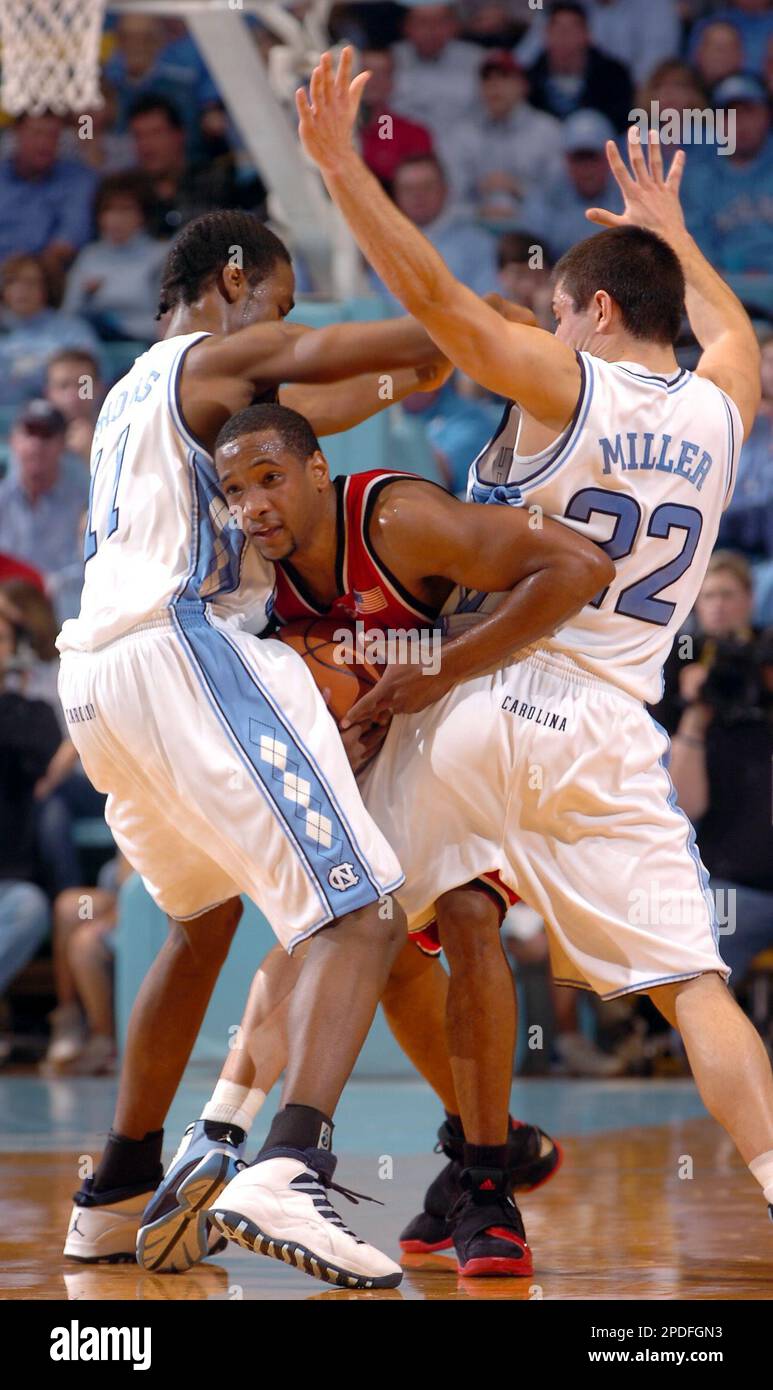 North Carolina State's Tony Bethel, center, is guarded by North ...